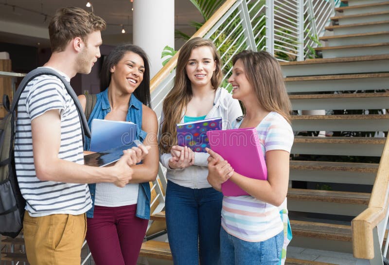 Smiling Students Chatting Together Outside Stock Photo - Image of adult ...