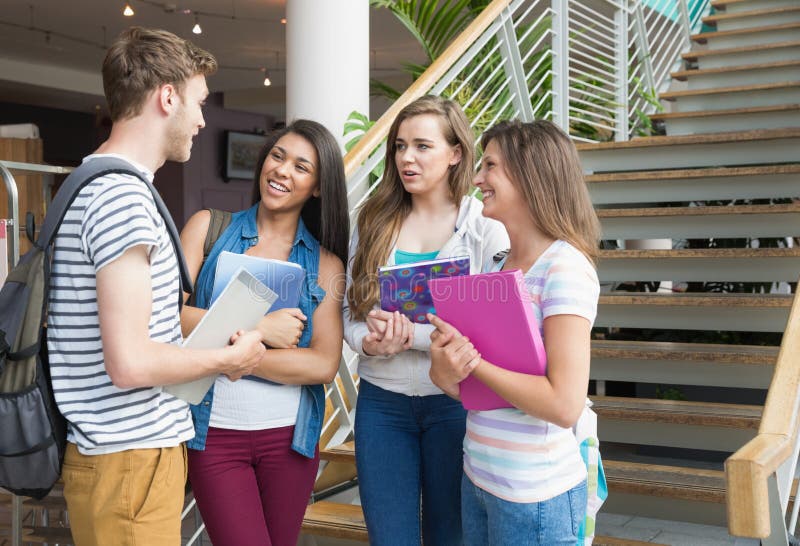 Smiling Students Chatting Together Outside Stock Photo - Image of ...