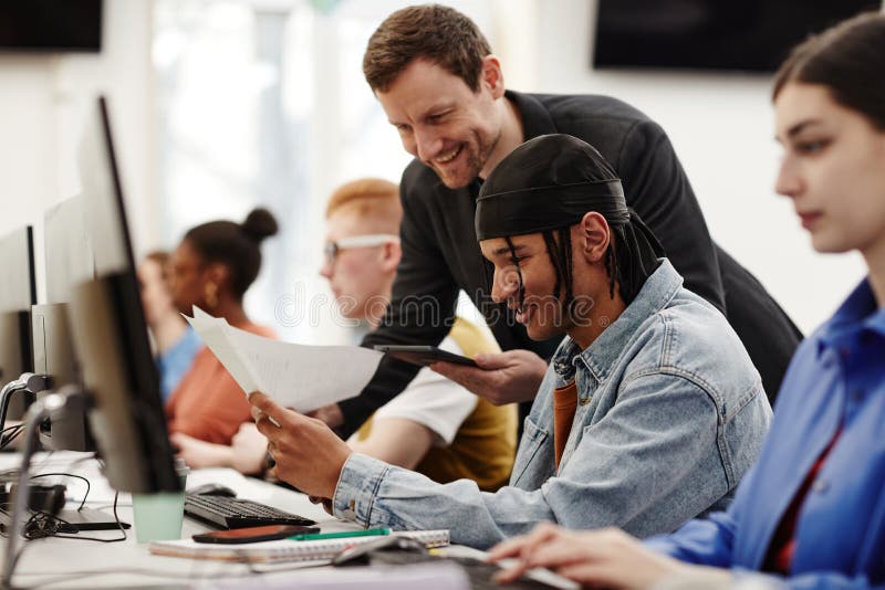 Smiling Students in Computer Lab Stock Photo - Image of smiling ...