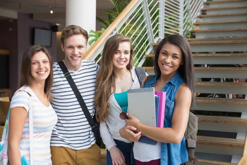 Smiling Students Looking at Camera Outside Stock Photo - Image of male ...