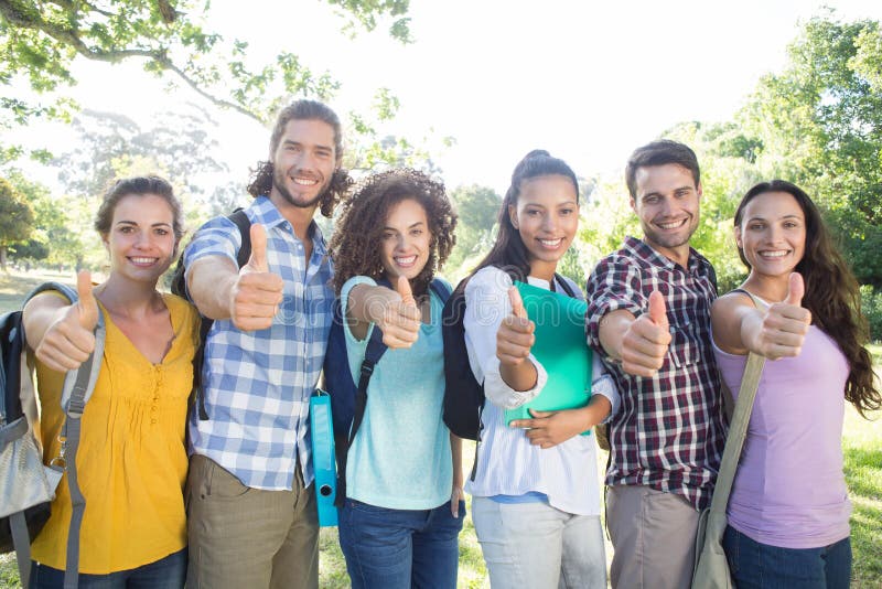 Smiling Students Showing Thumbs Up Stock Image - Image of communication ...