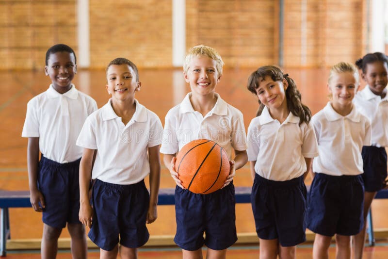 Smiling Students Standing with Basketball Stock Image - Image of happy ...