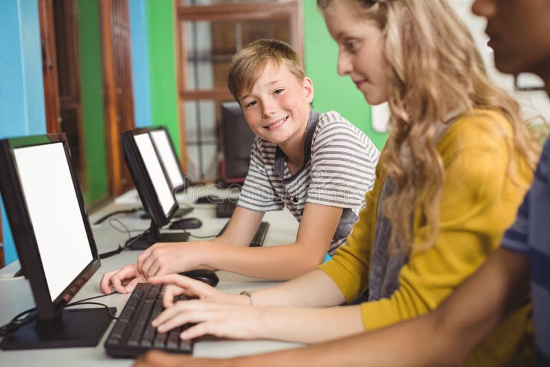 Smiling Students Studying in Computer Classroom Stock Photo - Image of ...
