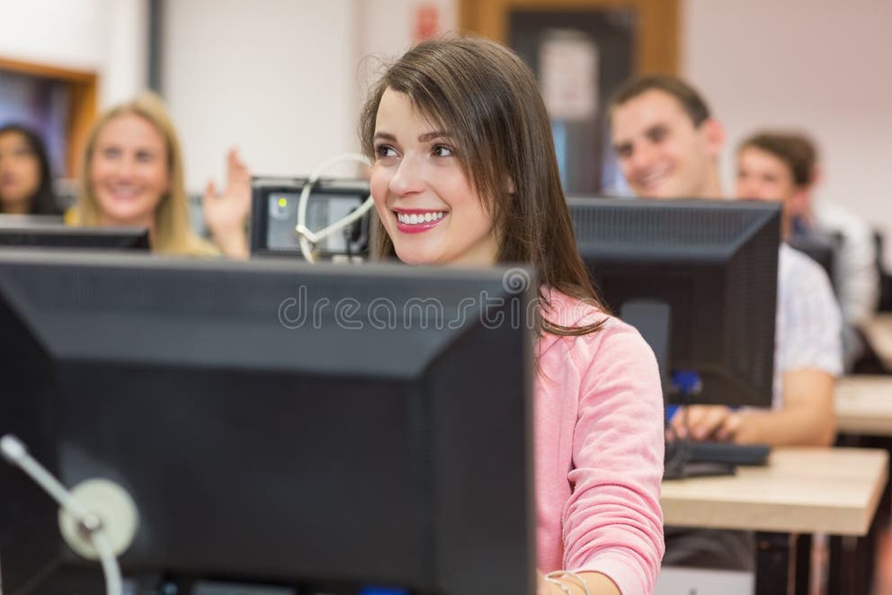 Smiling Students Using Computers in Computer Room Stock Photo - Image ...