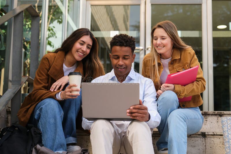 Smiling Students Using Laptop and Drinking Coffee on University Steps ...
