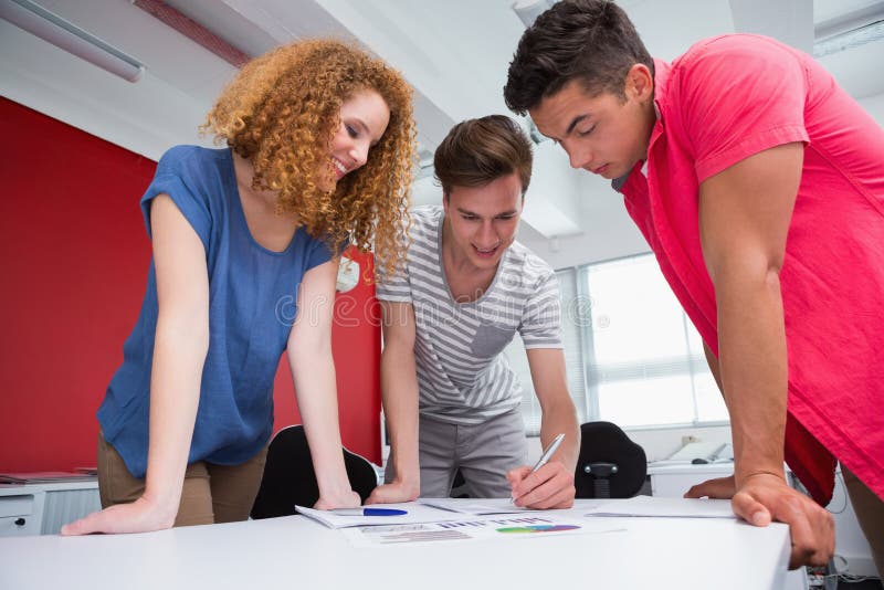 Smiling Students Working and Taking Notes Together Stock Image - Image ...
