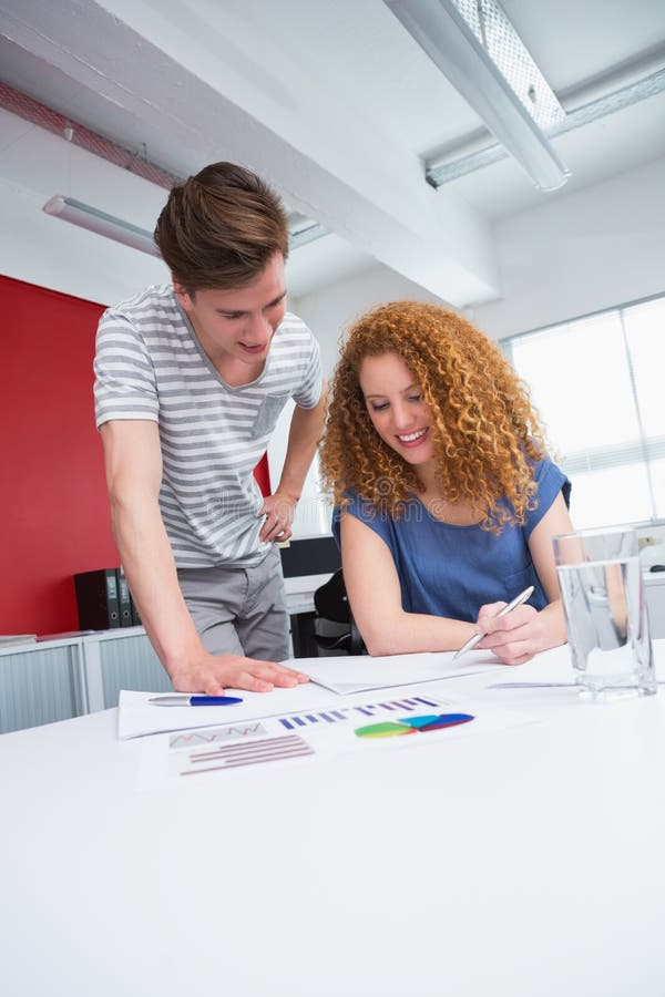 Smiling Students Working and Taking Notes Together Stock Image - Image ...