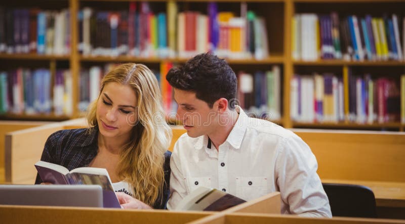 Smiling Students Working Together while Sitting at Table Stock Image ...