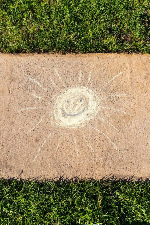 Smiling Sunshine Drawn with Chalk on a Sidewalk Stock Photo - Image of ...