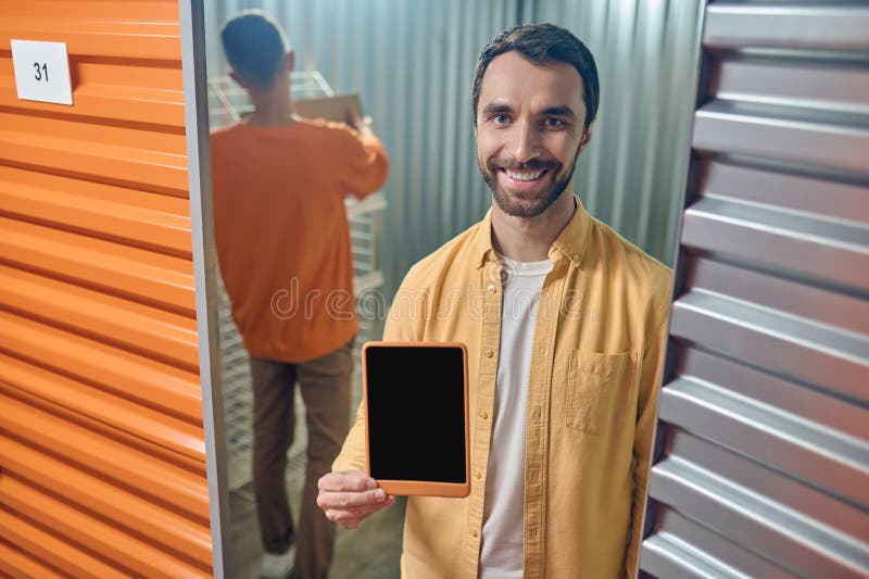 Smiling Supervisor and a Storehouse Worker Inside the Cargo Container ...
