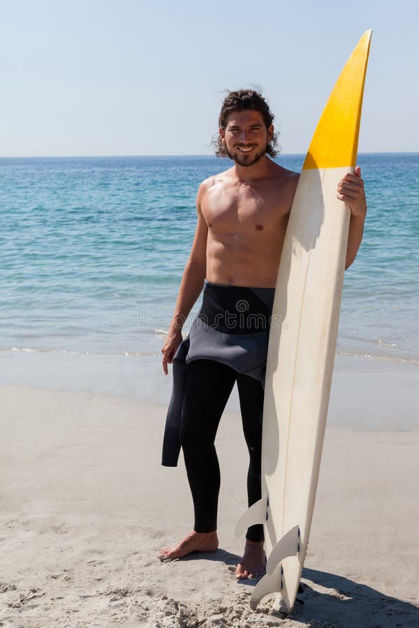 Smiling Surfer with Surfboard Standing at Beach Coast Stock Image ...