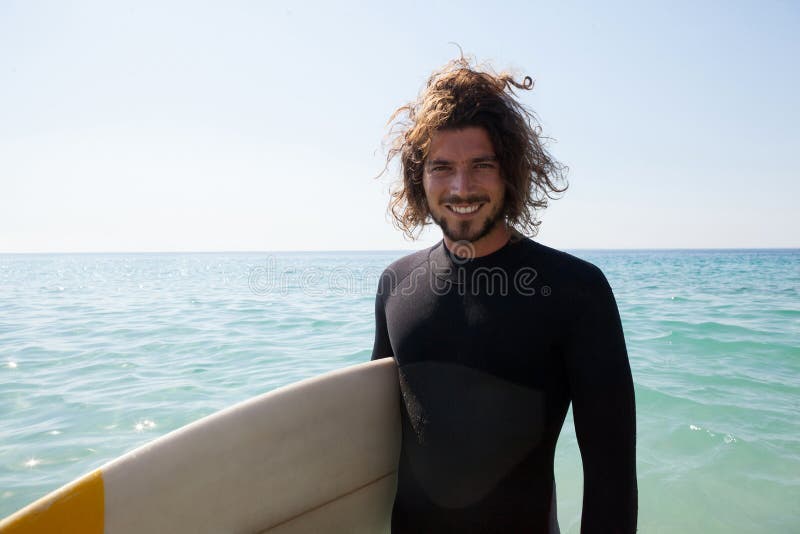 Smiling Surfer with Surfboard Standing at Beach Coast Stock Image ...