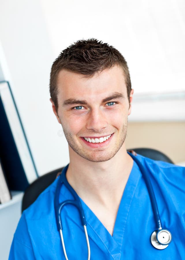 Smiling Surgeon Smiling and Wearing Scrubs Stock Photo - Image of ...
