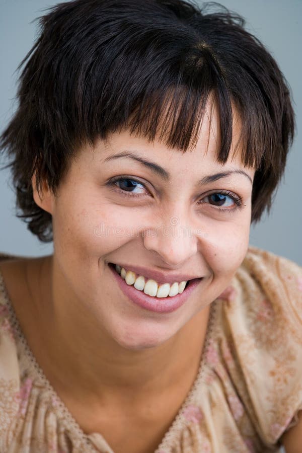 Smiling sweetly stock photo. Image of brunette, gorgeous - 2169380