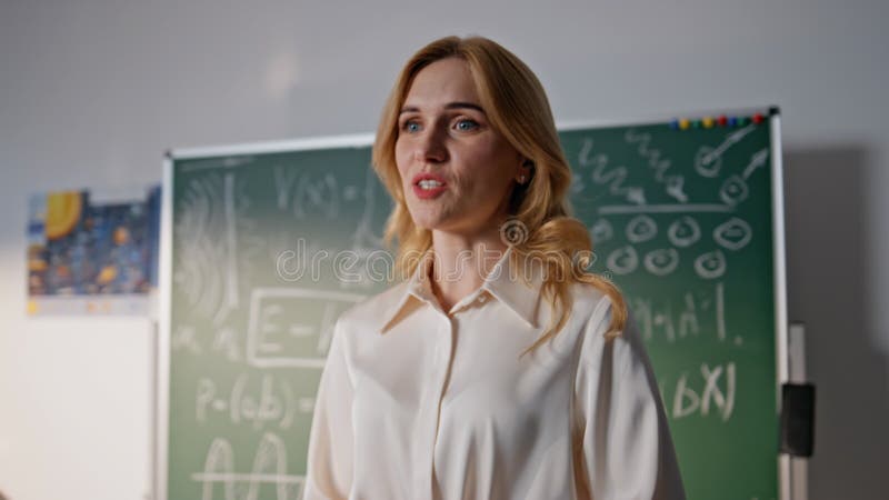 Smiling Teacher Explaining Math Standing Classroom Closeup. Woman Tutor ...