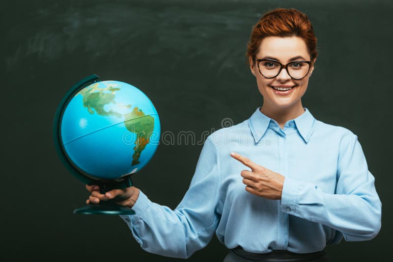 Smiling Teacher Pointing with Finger at Stock Image - Image of ...