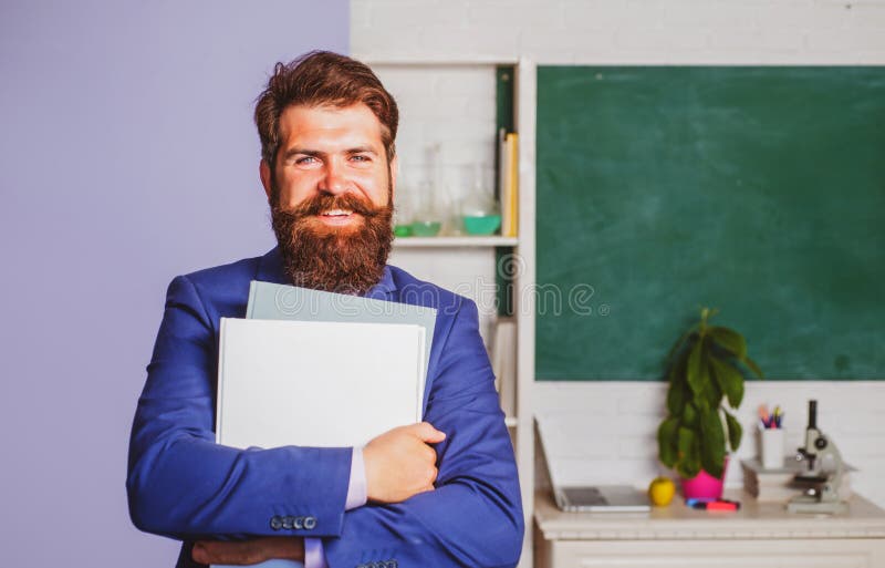 Smiling Teacher Professor Standing in Front of Blackboard Teaching ...