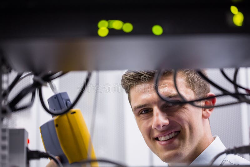Smiling Technician Standing in a Server Room Stock Photo - Image of ...