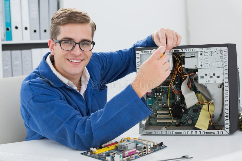 Technician Working on Personal Computer while Analyzing Server ...