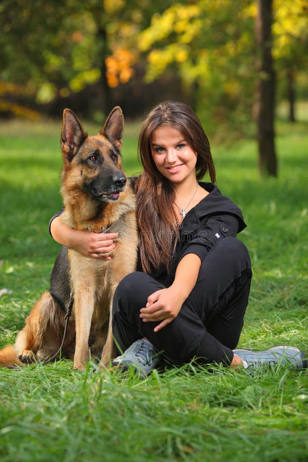 Smiling Teenager Hugging a Dog Stock Image - Image of green, nature ...