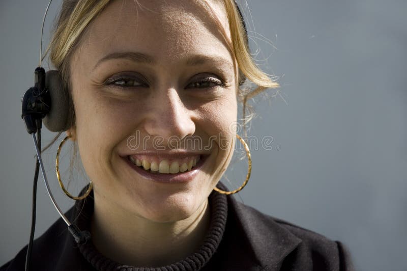 Smiling telemarketer stock photo. Image of headphone, operator - 3319730