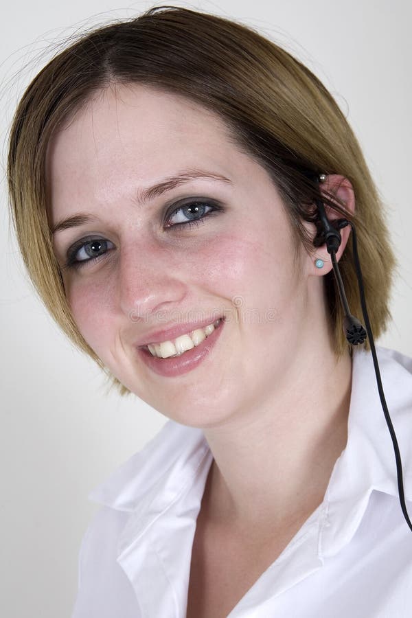 A smiling telesales girl stock photo. Image of headset - 2820422
