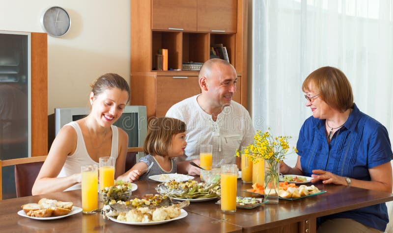 Smiling Three Generations Family Stock Photo - Image of glass, group ...