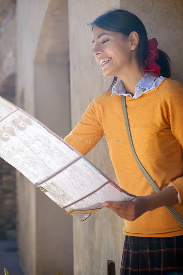 Smiling Tourist Woman Using Map As Guide on Vacation Stock Image ...
