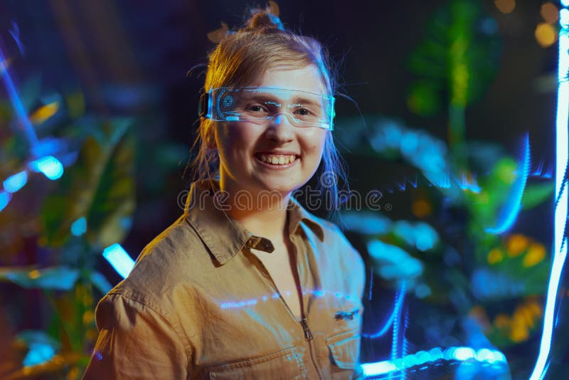 Smiling Child with Futuristic Glasses in Virtual Reality Stock Photo ...