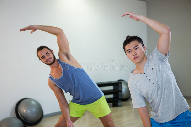 Smiling Two Men Doing Aerobic Exercise Stock Image - Image of happy ...