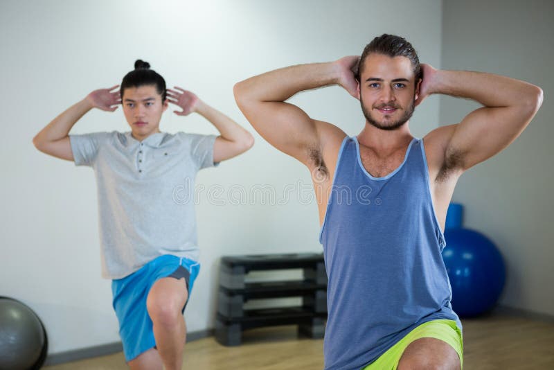 Smiling Two Men Doing Aerobic Exercise Stock Photo - Image of healthy ...
