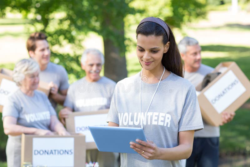 Smiling Volunteer Group Putting Hands Together Stock Image - Image of ...