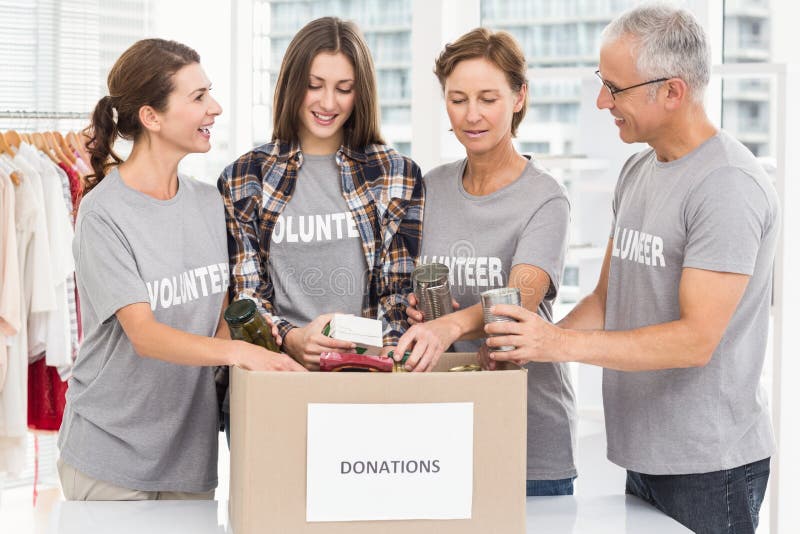 Volunteers Sorting Donations Stock Image - Image of donation, care ...
