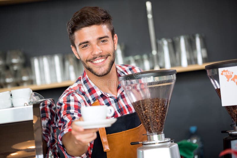Smiling Waiter Offering Cup of Coffee Stock Image - Image of happy ...