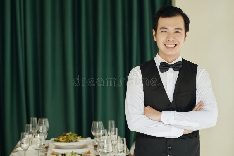 Smiling Waiter in Uniform Working in the Restaurant Stock Photo - Image ...