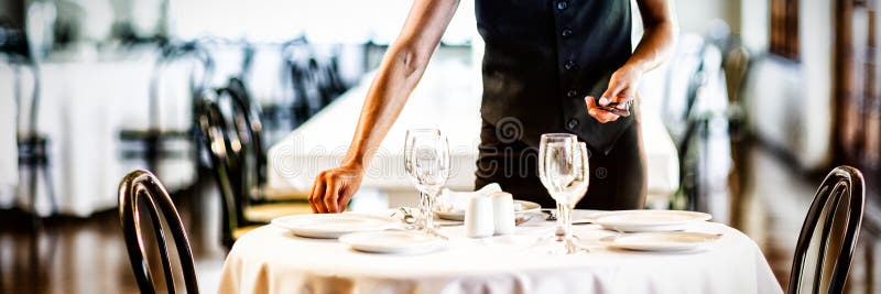 Smiling Waitress Setting the Table Stock Image - Image of waitress ...