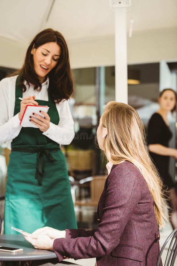 Smiling Waitress Taking an Order Stock Photo - Image of lifestyle ...