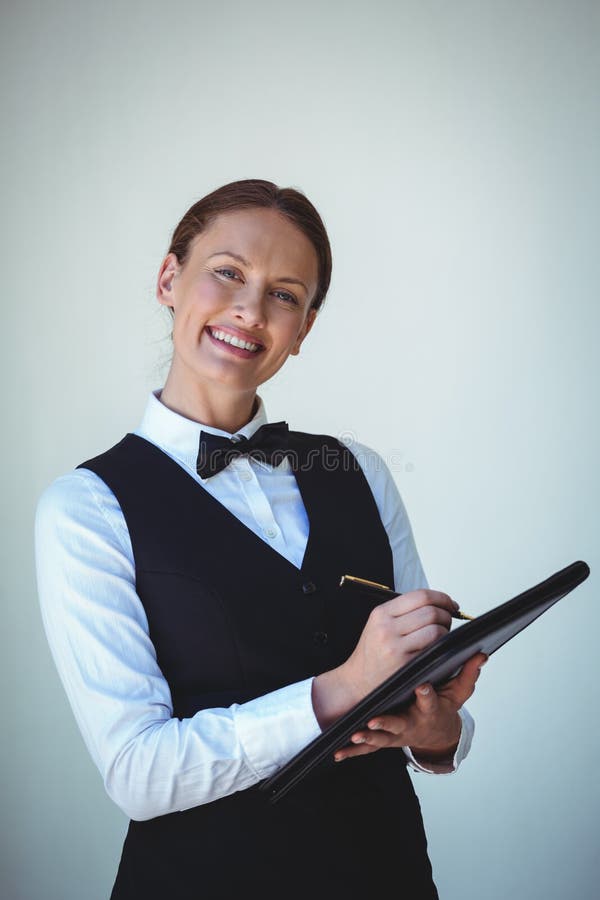 Smiling Waitress Taking an Order Stock Photo - Image of elegant ...