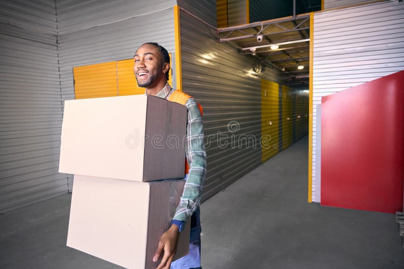 Smiling Warehouse Loader Posing for Camera at Work Stock Photo - Image ...