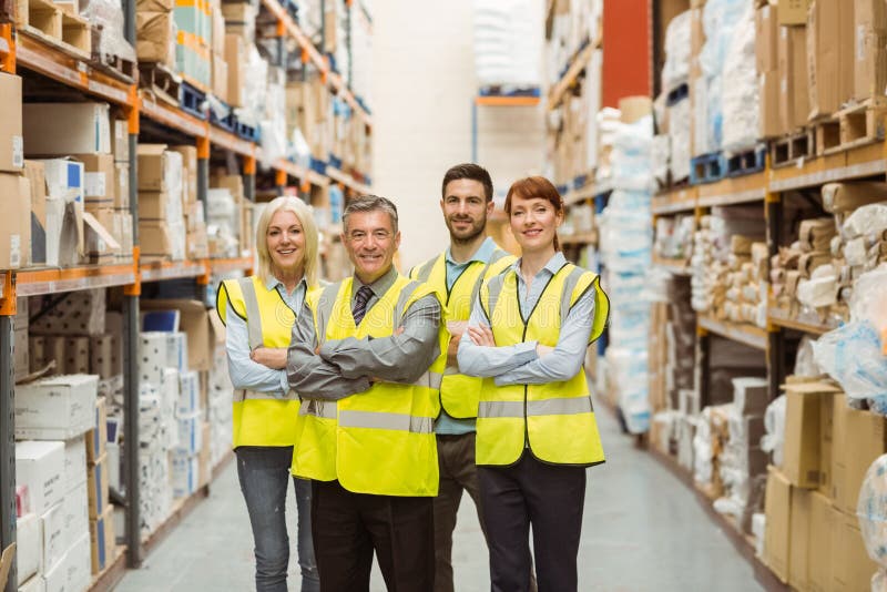 Smiling Warehouse Team with Arms Crossed Stock Image - Image of manager ...