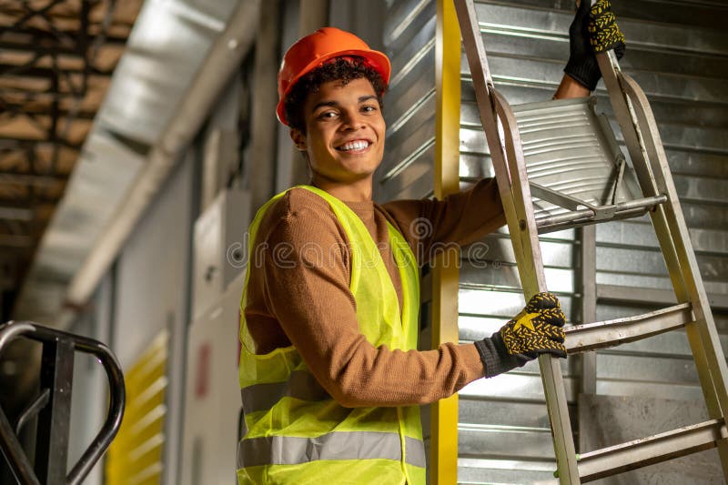Smiling Warehouse Worker with the Ladder Stock Image - Image of male ...