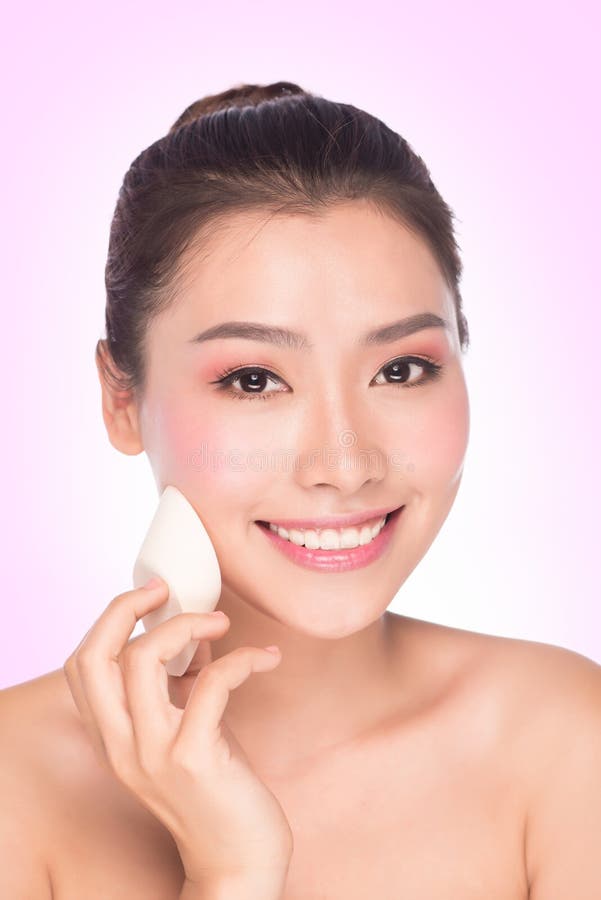 Smiling Woman Applying a Make-up Base Stock Photo - Image of health ...
