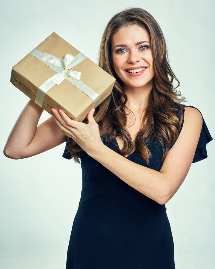 Smiling Woman in Black Evening Dress Holding Gift Box. Stock Image ... Smiling Woman in Black Evening Dress Holding Gift Box. Stock Image ...