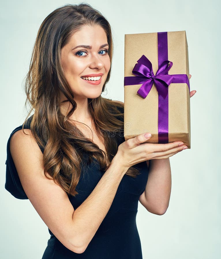 Smiling Woman in Black Evening Dress Holding Gift Box Stock Photo ... Smiling Woman in Black Evening Dress Holding Gift Box Stock Photo ...