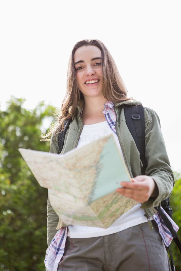 Smiling Woman Checking the Map Stock Photo - Image of checking ...