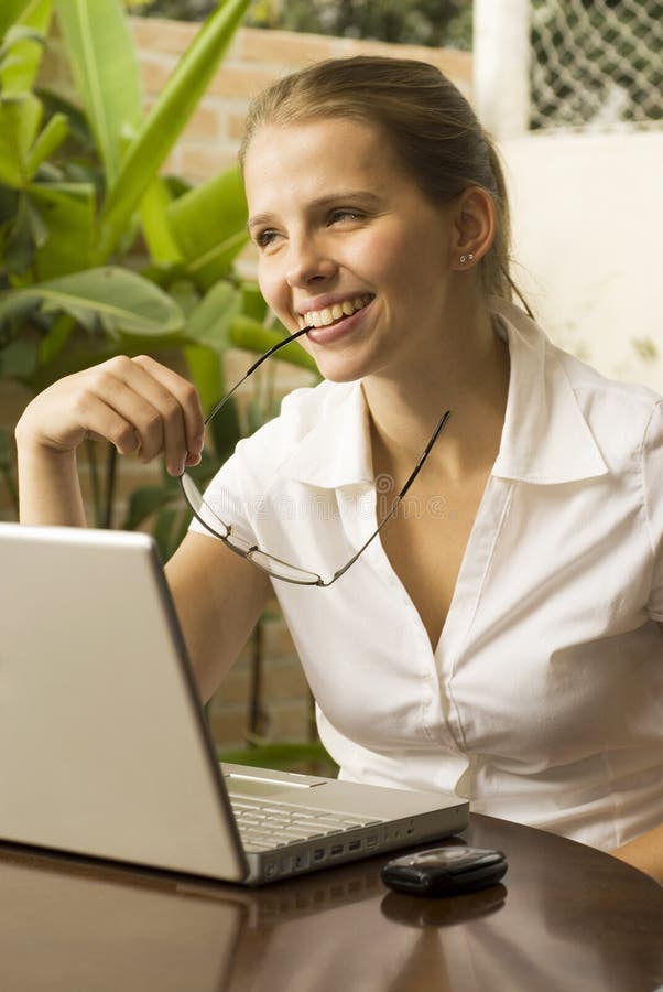Smiling woman at computer stock photo. Image of female - 3858312