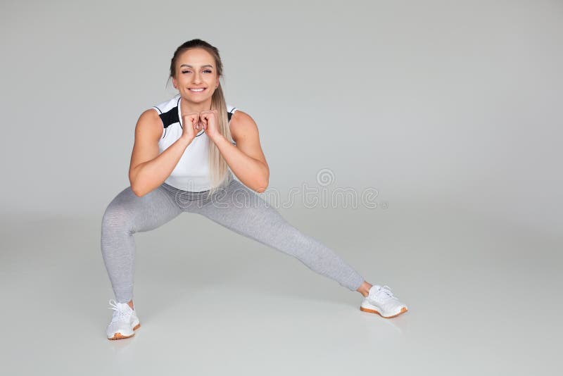 Smiling Woman Doing Exercise Stock Image - Image of sportive, training ...