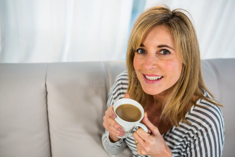 Smiling Woman Drinking Some Tea Stock Image - Image of home, lounge ...