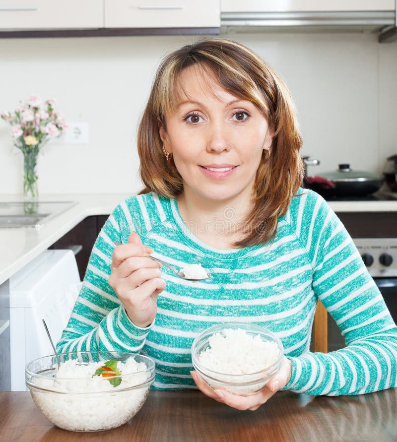 Smiling Woman Eating Boiled Rice Stock Image - Image of kasha, bowl ...