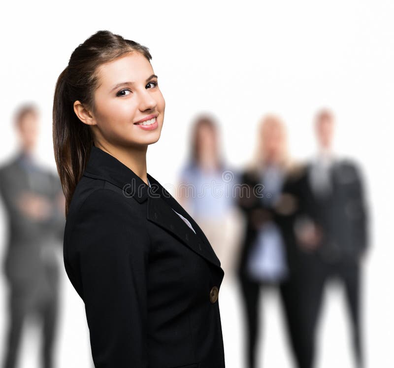 Smiling Woman in Front of a Group of People Stock Photo - Image of ...